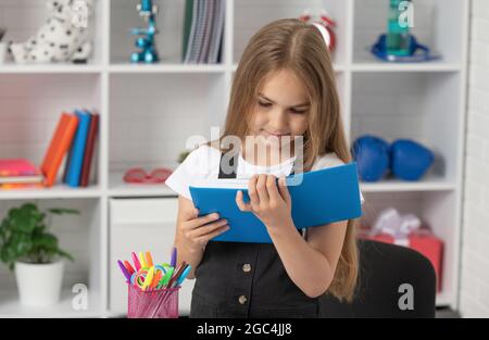 Teen girl pupil hold books, notebooks, isolated on white background ...