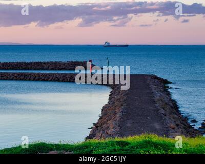 Breakwater wall at twilight - Portarlington, Victoria, Australia Stock ...
