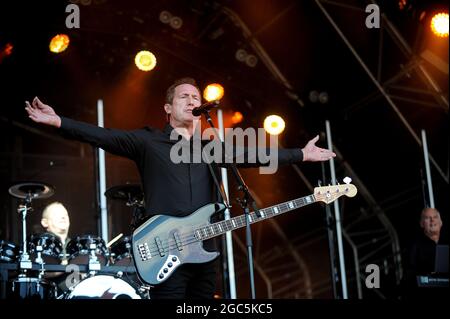 OMD , Performing Live in concert , Keepmoat Stadium , Doncaster , 14.06 ...
