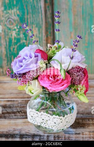 Bouquet with rose, eustoma and lavender flowers. Summer decor Stock ...