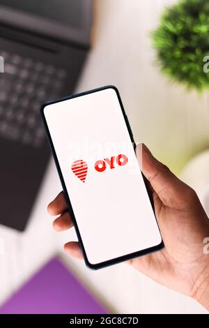 Assam, India - August 6, 2021 : Oyo logo on phone screen stock image ...