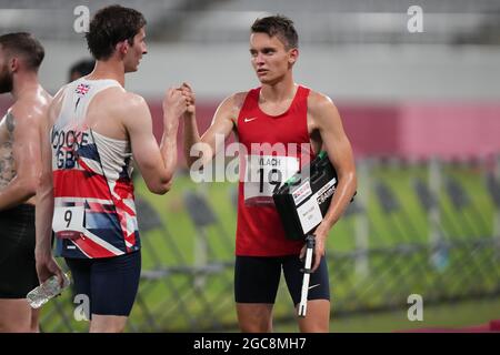 Athletes from Britain attend the Olympic opening ceremony at the 2026 ...