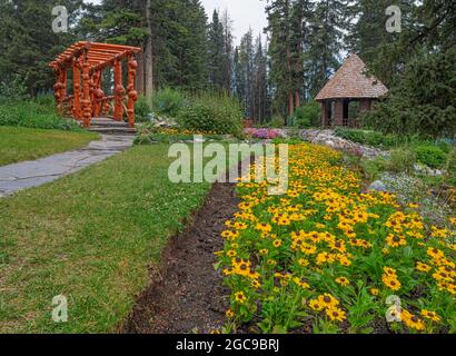A wooden gazebo in a park in Banff National Park in the town of Banff ...