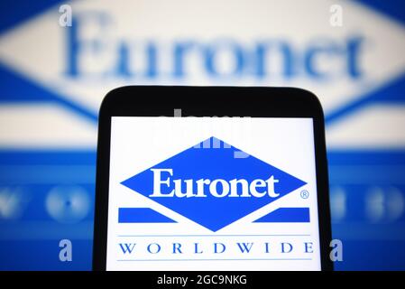 In this photo illustration, the Euronet Worldwide, Inc. logo is ...