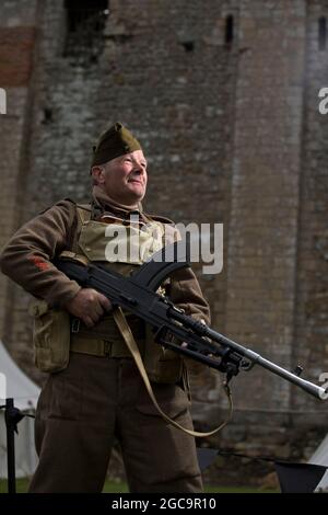A British Army Desert Rat in the turret of a tank wearing mask and ...