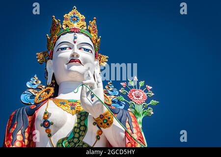 buddhist colorful goddess statue with flat blue sky at morning image is ...