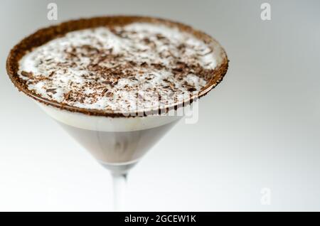 Alcoholic coffee cocktail with a nutty note and fluffy milk foam on the ...