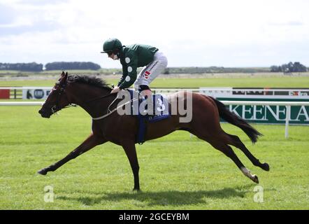 Cairde Go Deo ridden by jockey Colin Keane (right) on their way to ...