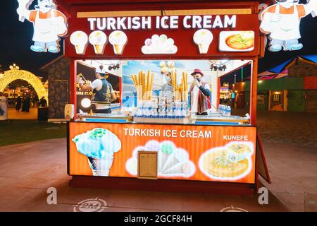 Turkish ice cream vendor jokes and customers having fun. Traditional ...
