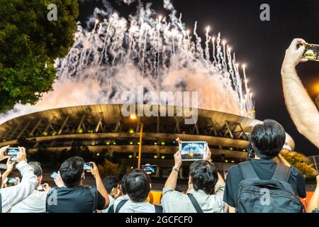 People gather outside of National Stadium during closing ceremony of ...