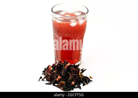 Fresh refrigerated Roselle juice glass with dried Roselle herbs ...