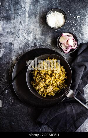Bowl of traditional Georgian pickled jonjoli appetiser with salt Stock ...