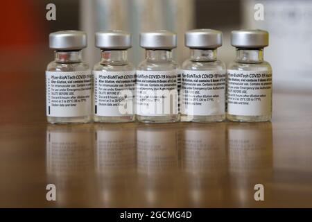 Vials containing Pfizer-BioNTech Covid-19 vaccine seen at a vaccination ...