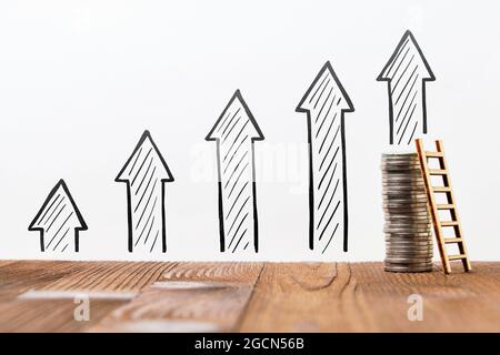 Business and finance concept. Arrows are drawn on the board, inside ...