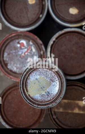 Rusty paint cans Stock Photo - Alamy