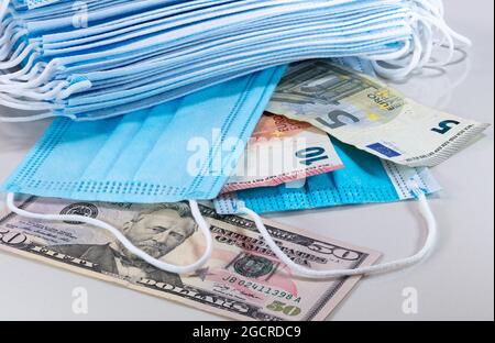 Euro money banknotes with a face mask Stock Photo - Alamy