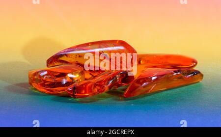 Amber made of yellow transparent fossil resin with insect inclusions ...