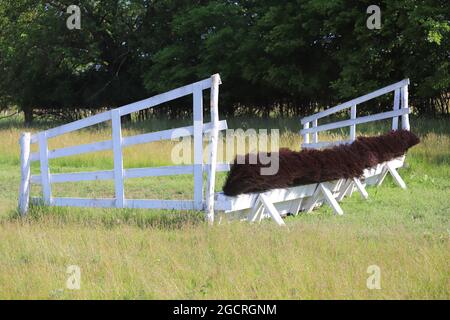 Cross-country wooden fence obstacle for an equestrian cross country ...