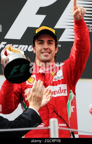 Spanish Fernando Alonso of Ferrari celebrates on the podium after the ...
