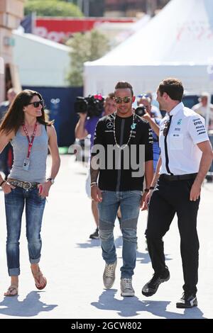 (L to R): Cyndie Allemann (SUI) Racing Driver, with Lewis Hamilton (GBR ...