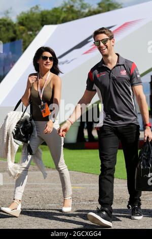 Tv Presenter Marion Jolles and Romain Grosjean attend the Pirelli 2011 Calendar launch at Le ...
