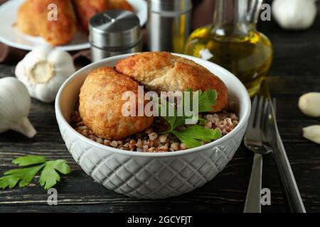 Concept of tasty food with cutlets on white wooden table Stock Photo ...