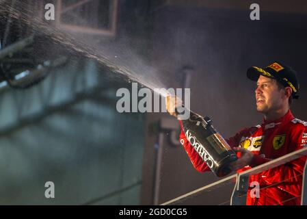 Race winner Sebastian Vettel (GER) Ferrari celebrates on the podium. 25 ...
