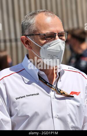 Stefano Domenicali, President & CEO of Formula 1, waves to the crowd ...