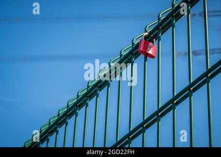 A Love lock on a gate with blurry background Stock Photo - Alamy