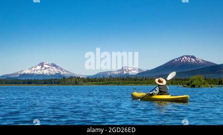 Kayaking at Crane Prairie Reservoir in the Cascades Lakes area of ...