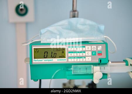 A syringe pump, a dropper for anesthesia and drug administration during ...