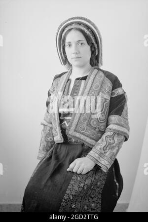 Ramallah woman in embroidered costume. 1940. Reimagined by Gibon ...