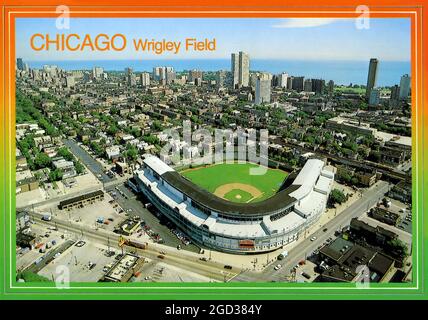 Aerial view of Wrigley Field with Chicago Illinois skyline in ...