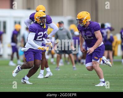August 10, 2021: LSU linebackers Mike Jones Jr. (19) and Sloan Wright ...