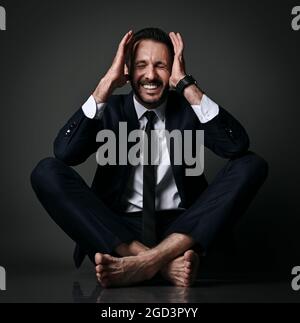 Office Manager in stylish shoes, blue pants and bright, colorful socks ...