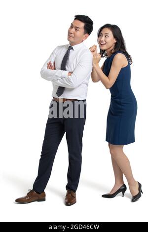 Businesswoman flattering businessman Stock Photo - Alamy