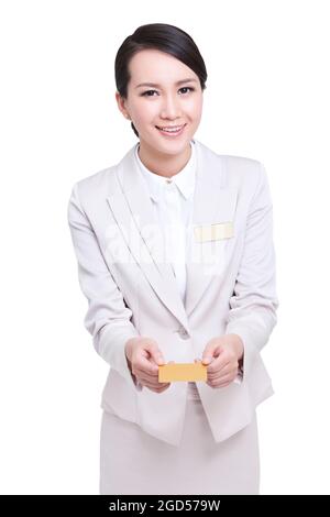 Businesswoman handing bank card out Stock Photo - Alamy