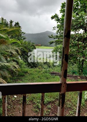 Khopoli Dam with trees cloudy climate Stock Photo - Alamy