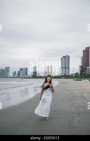 Photo of adorable happy charming woman hold fists cheekbones good mood ...
