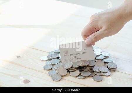 A Dedit cards with coins Stock Photo - Alamy