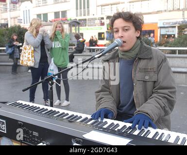 Britains youngest busker Adam Davis performs at Churchill Square in ...