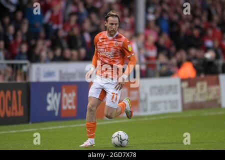 Josh Bowler #11 of Blackpool runs at Kenneth Paal #22 of QPR Stock ...