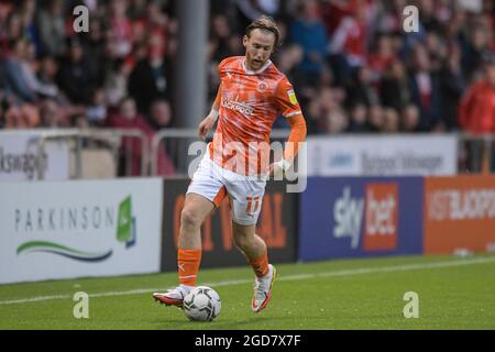 Josh Bowler #11 of Blackpool runs at Kenneth Paal #22 of QPR Stock ...