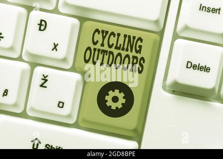 Hand writing sign Cycling Outdoors. Business idea sport or technique of ...