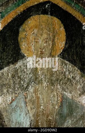 Angel in almond-shaped mandorla frame, flanked by soaring medieval ...