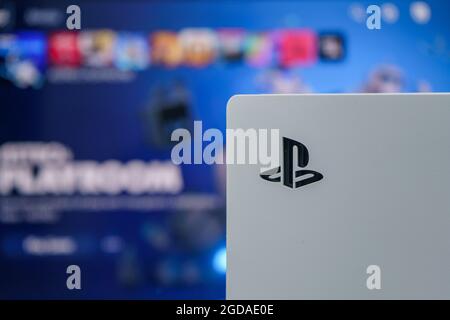 Sony PlayStation 5. New generation gaming computer. People playing ...