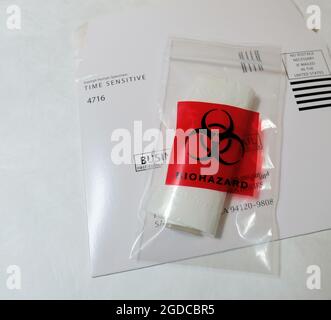 Clear plastic zip lock biohazard specimen bag with carboard mailing ...