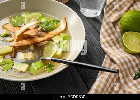 Plate of tasty Sopa de Lima soup on table, closeup Stock Photo - Alamy