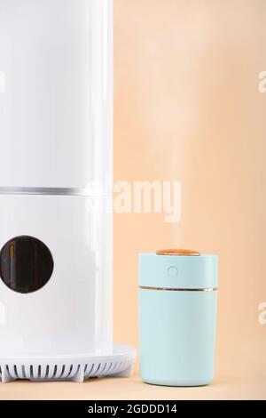 Set of modern air humidifiers on white background Stock Photo - Alamy