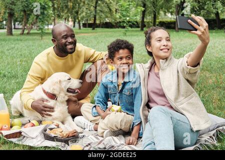 Family Picnic Outdoors Togetherness Relaxation Concept Stock Photo - Alamy